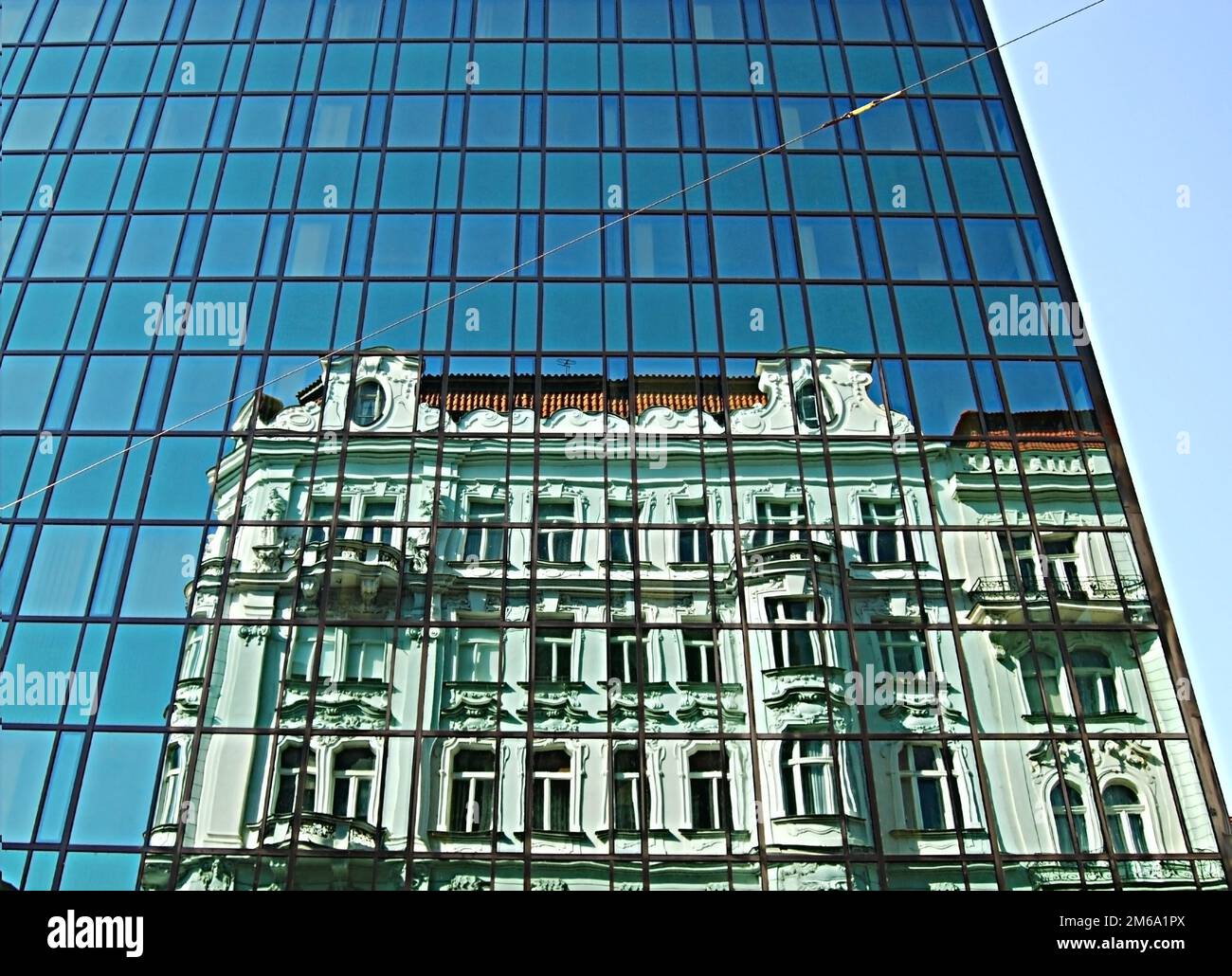 Modern office building glass wall, reflection Stock Photo - Alamy
