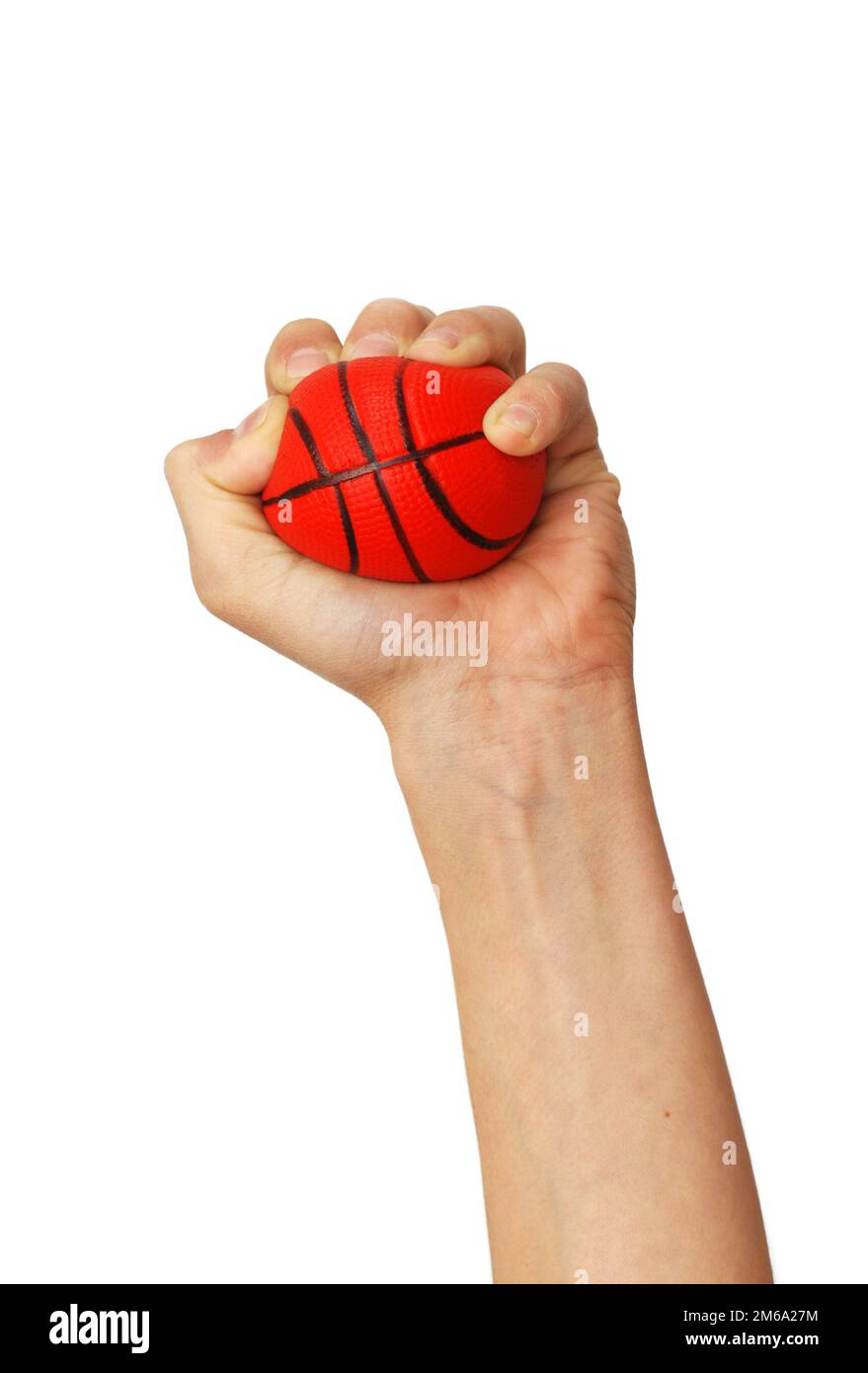 Hands squeezing ball toy Stock Photo - Alamy