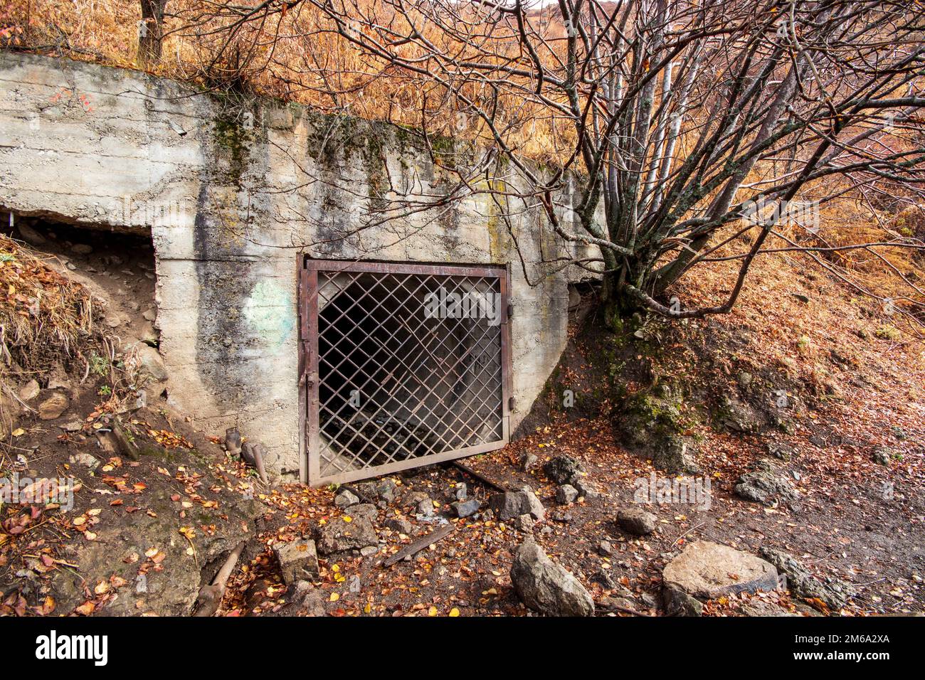 Closed mountain adit along the Old Japanese Road in the Big Almaty ...