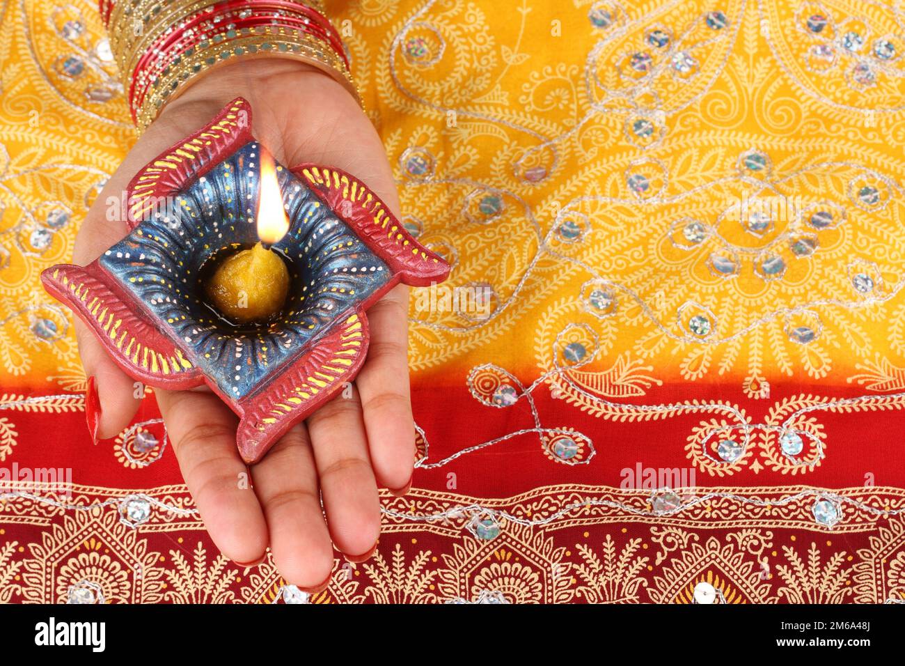 Handmade Diwali Diya Lamp in Hand Stock Photo - Alamy