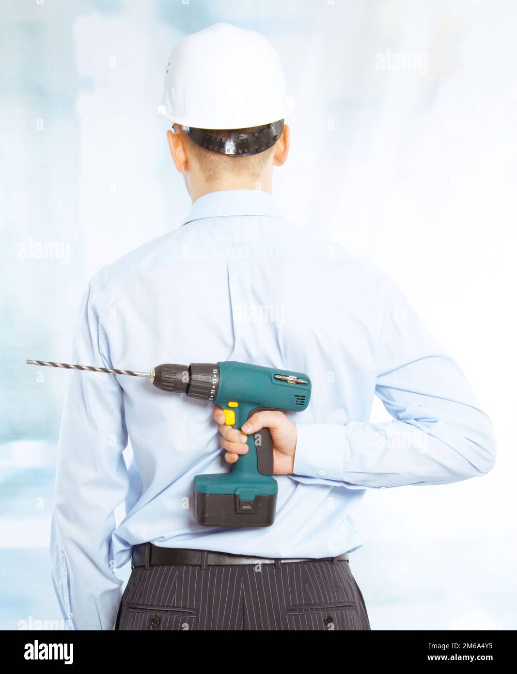 Male worker with cordless drill Stock Photo - Alamy