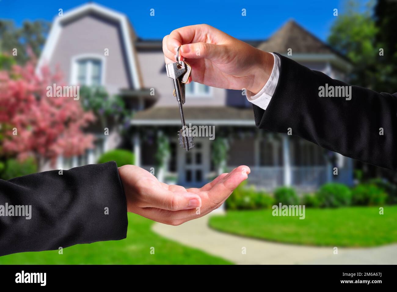 Handing over the keys Stock Photo - Alamy