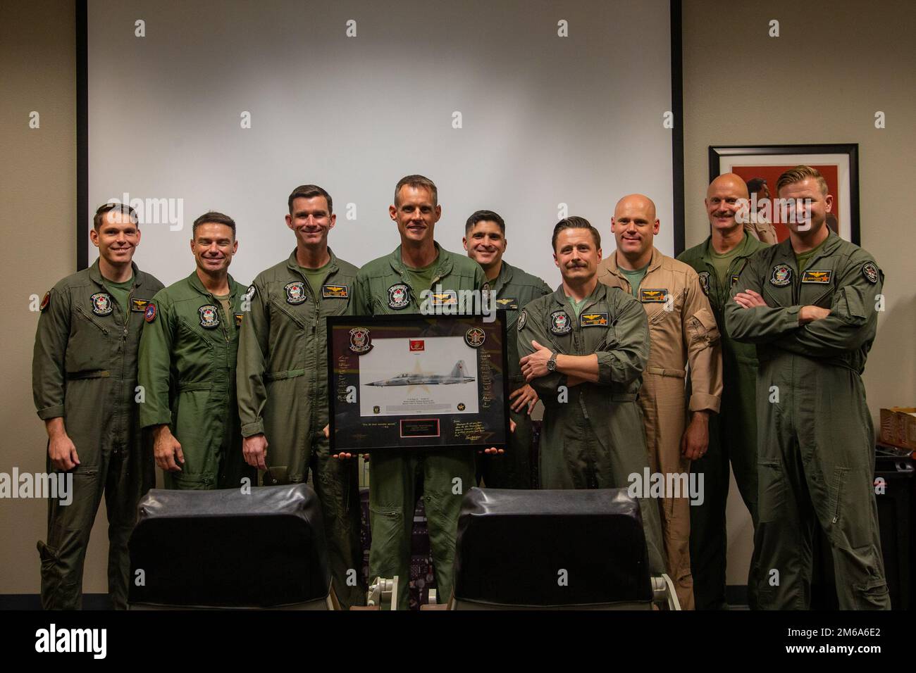 U.S. Marine Corps pilots pose for a photo with Lt. Col. Jonathan ...