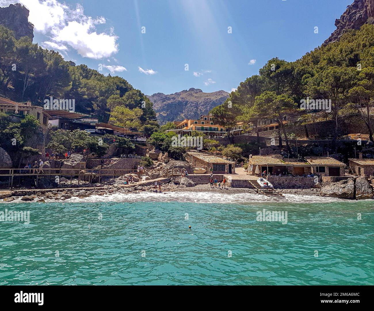 A scenic shot of tourists exploring the island of Mallorca in the ...