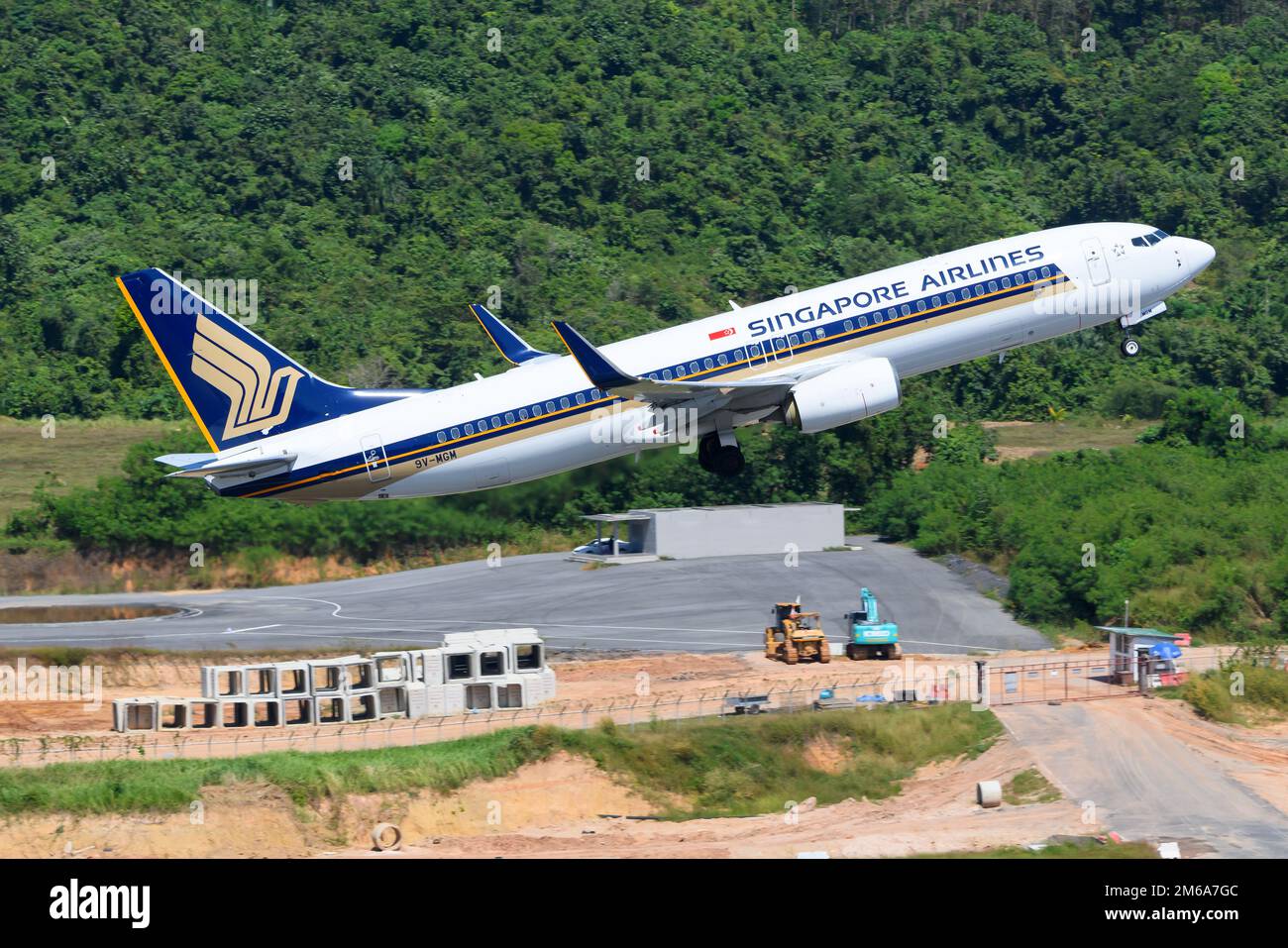 Singapore Airlines Boeing 737 aircraft taking off. Departure of SQ ...