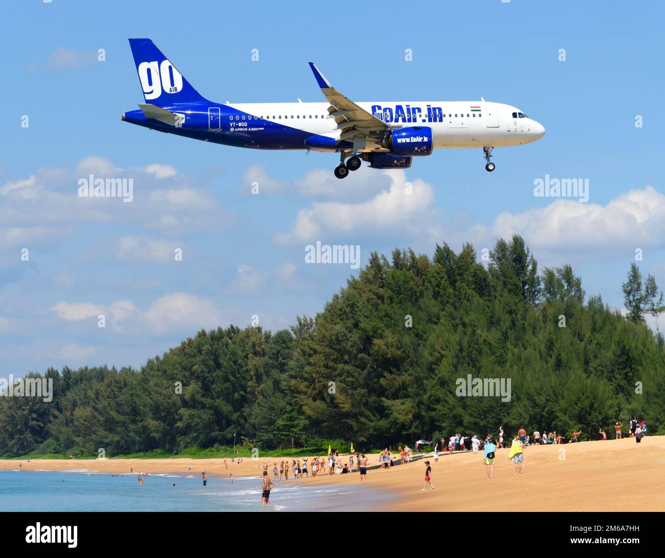 GoAir airline Airbus A320 airplane over Mai Khao Beach. Aircraft A320neo of Go Air India over ...