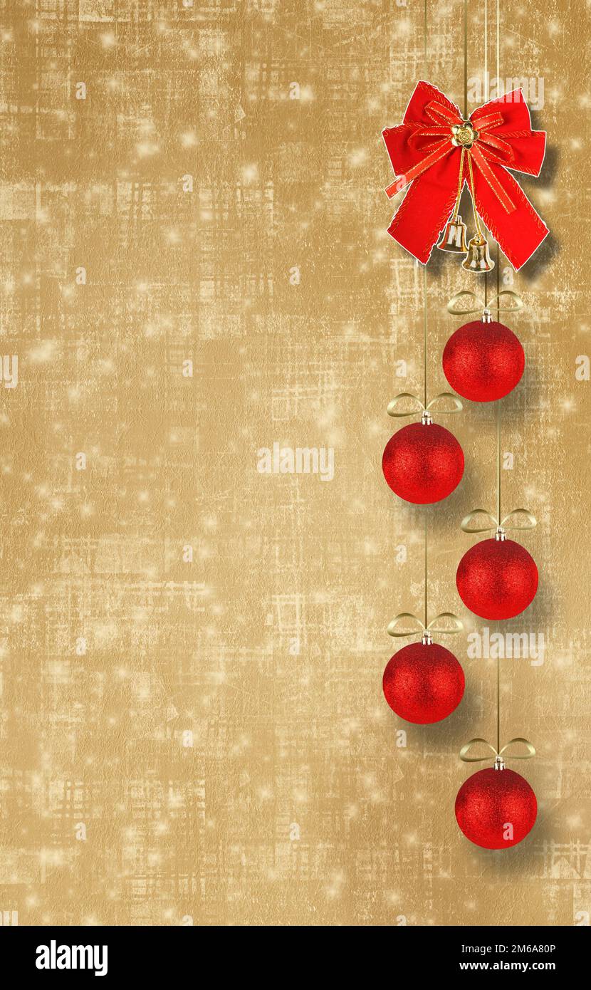 Christmas balls and red bow with bells on abstract snowy background ...