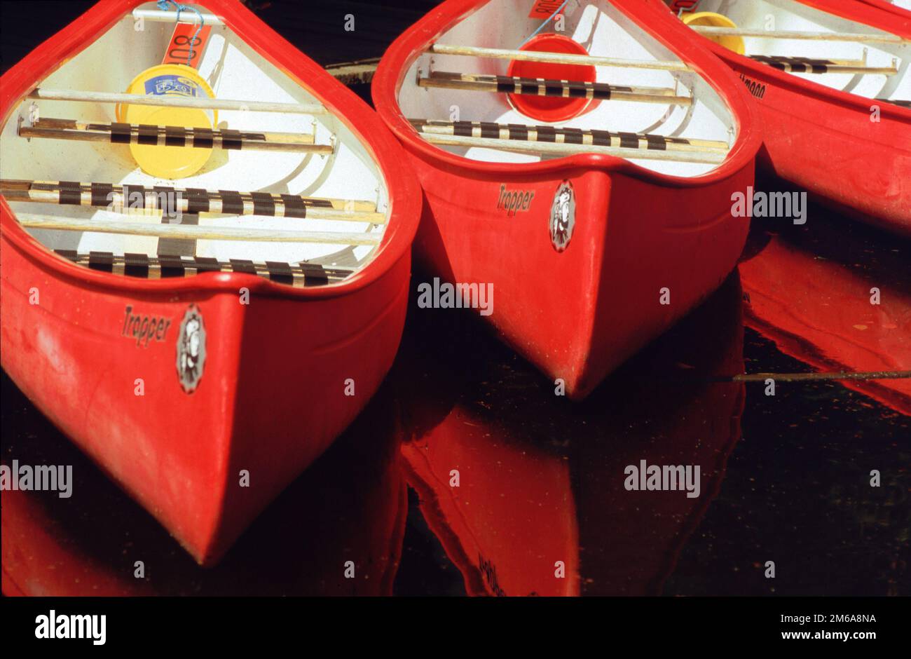 Three red boats Stock Photo - Alamy