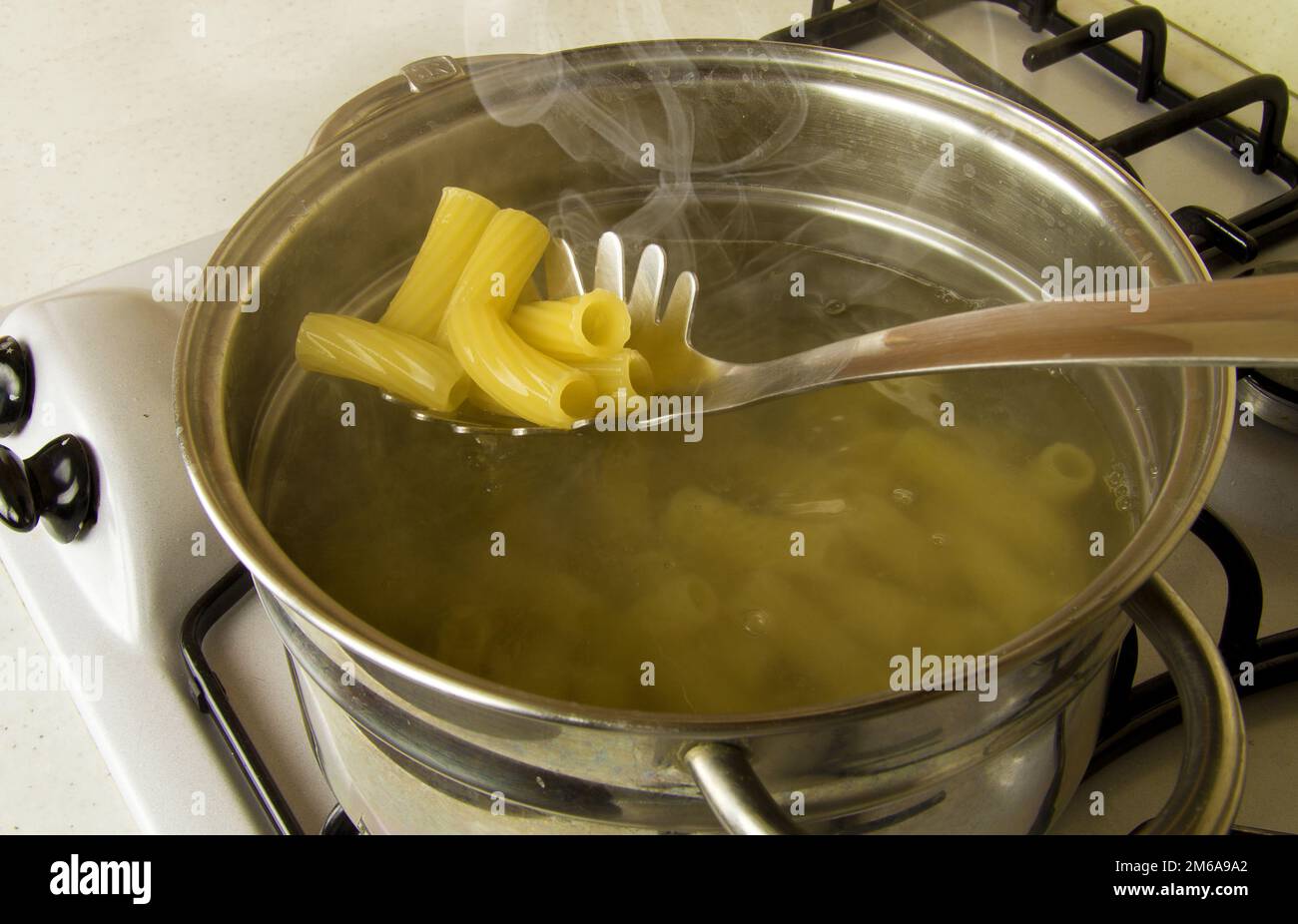 Boil pasta hi-res stock photography and images - Alamy
