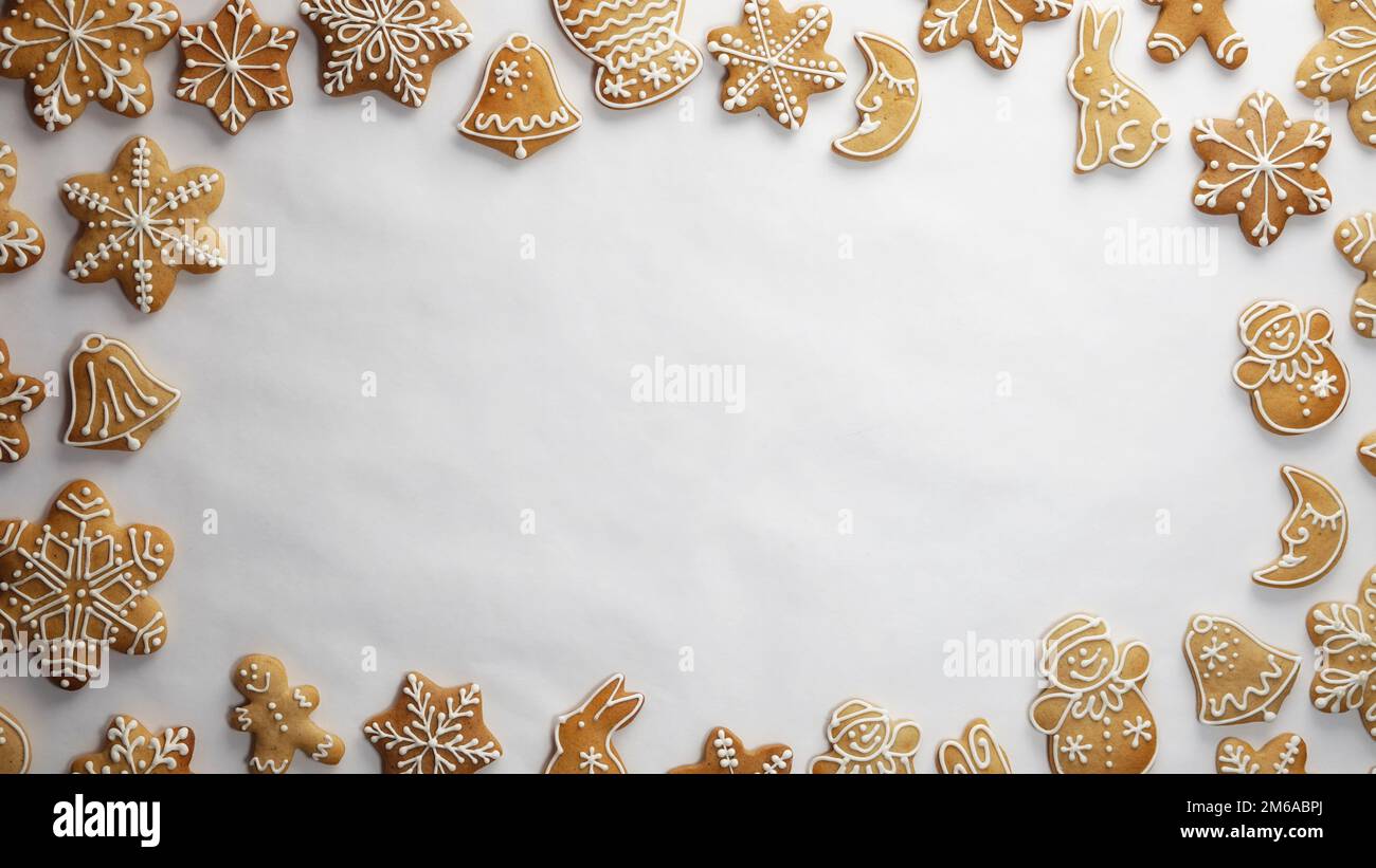 Christmas gingerbread frame on a white paper background and place for ...