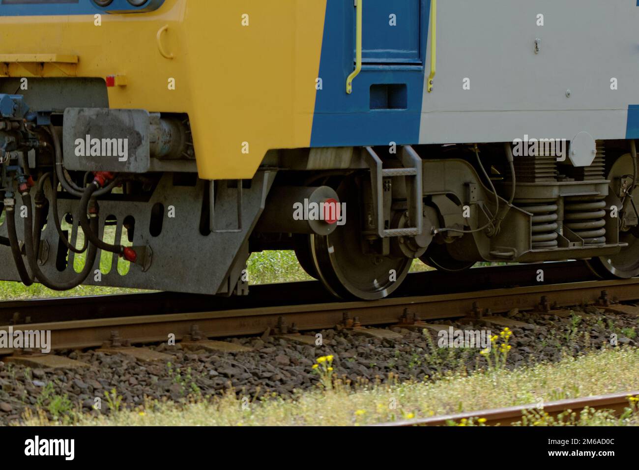 Train moving on railroad tracks Stock Photo - Alamy