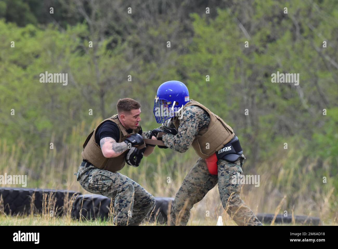 Cpl. Michael Burdick, right, a motor vehicle operator at Combined Arms ...