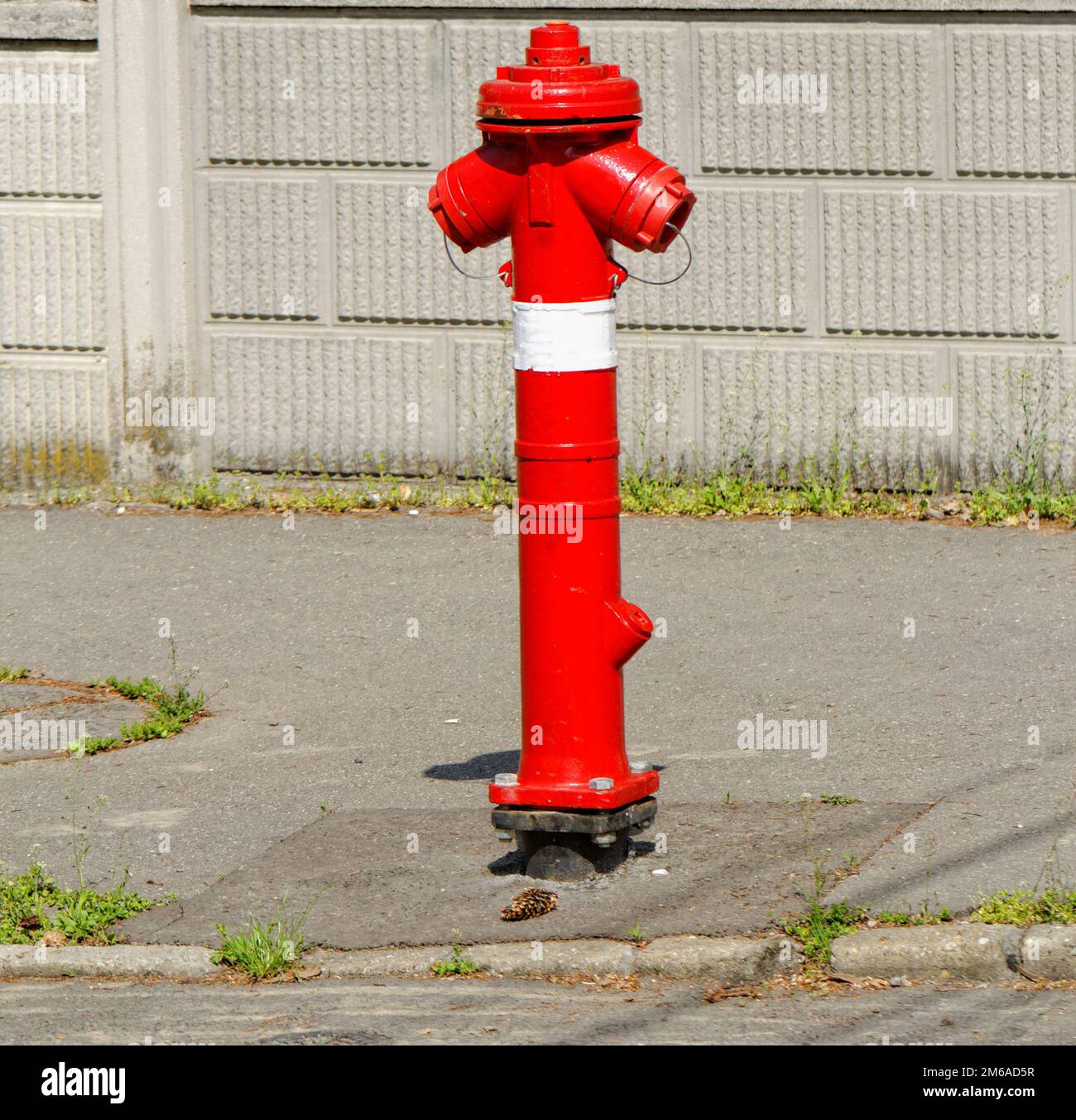 Red fire hydrant on the sidewalk Stock Photo - Alamy
