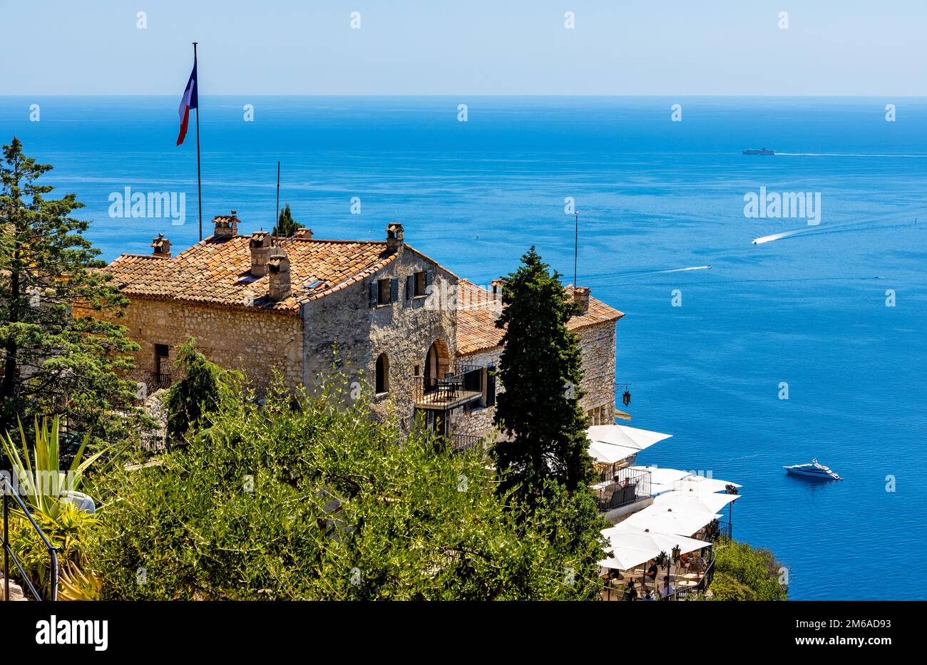 Eze, France - August 1, 2022: Chateau Eza hotel on slope of medieval ...