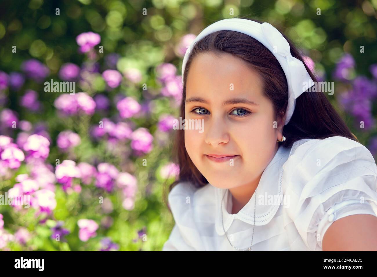Cute Little Girl with her First Communion Dress Stock Photo - Alamy