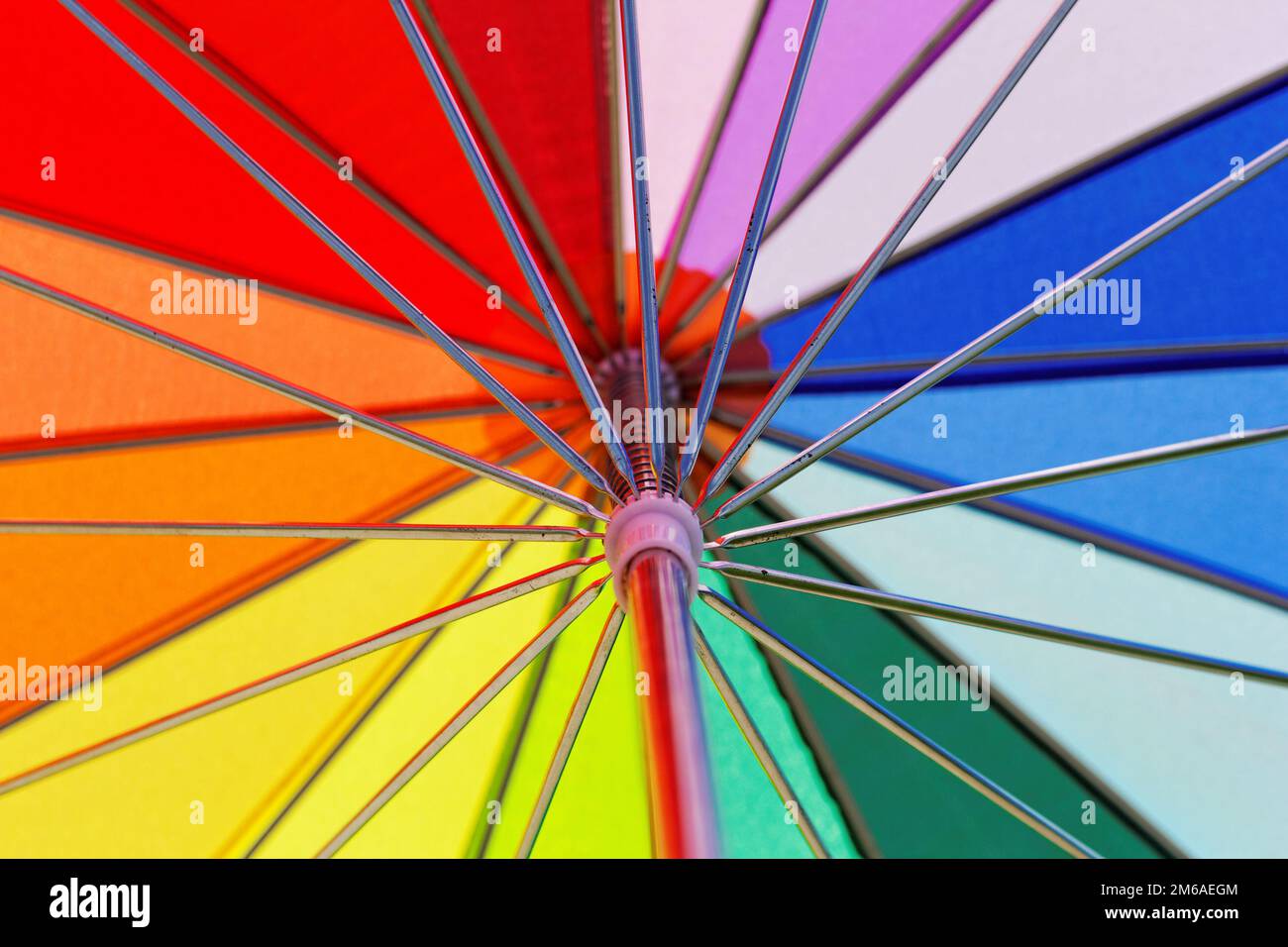 Rainbow colored umbrella Stock Photo - Alamy