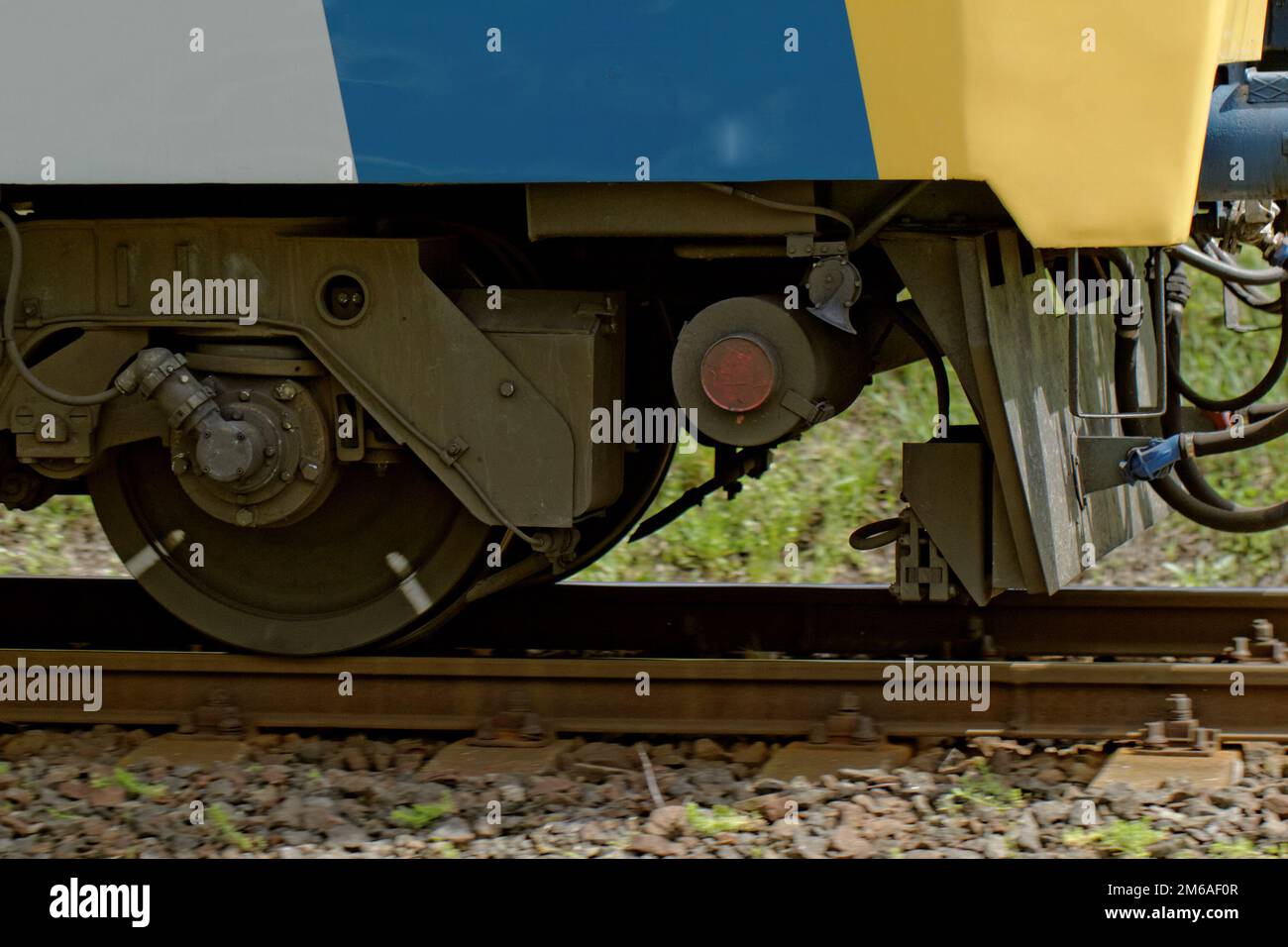 Train moving on railroad tracks Stock Photo - Alamy