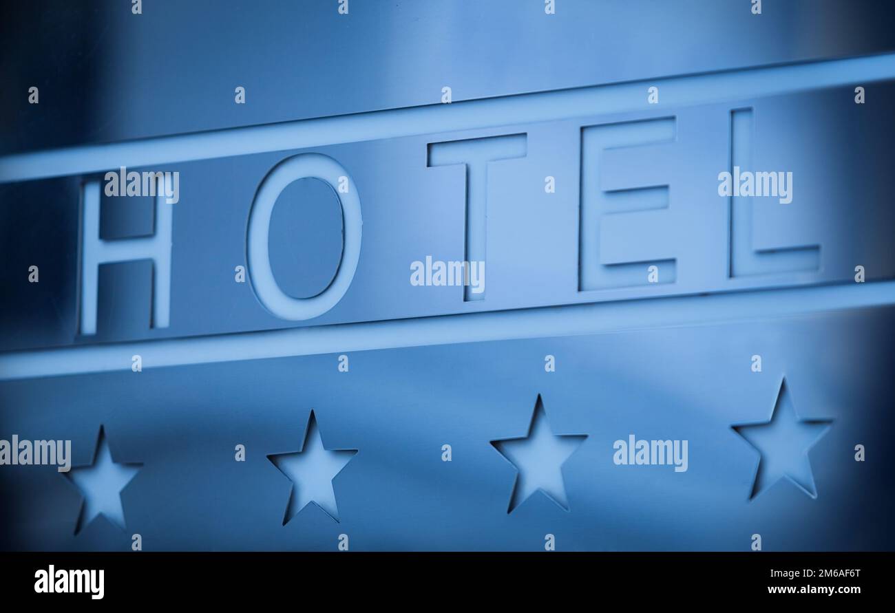Hotel Metallic Sign Stock Photo - Alamy