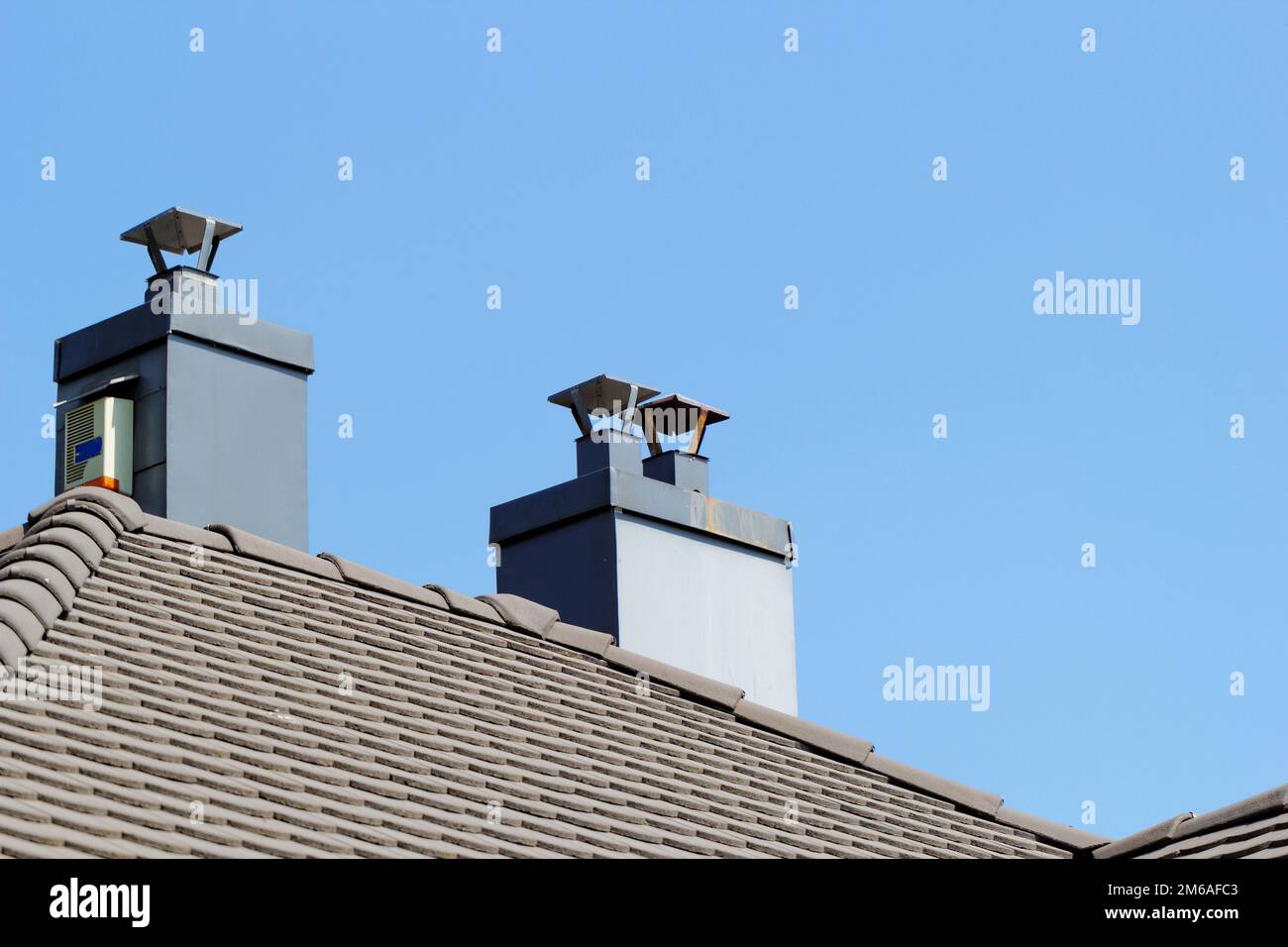 Chimney on the roof Stock Photo - Alamy