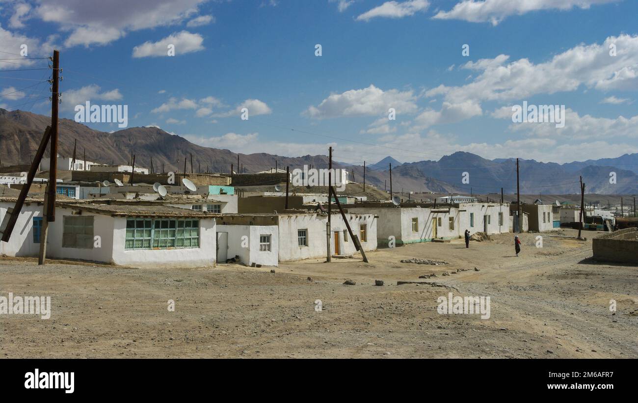 Cityscape view of high-altitude Murghab town with mountain background ...