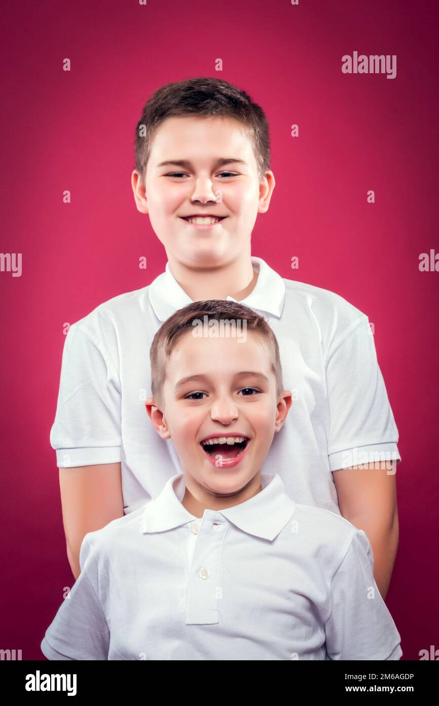 Little Brothers Smiling Stock Photo - Alamy