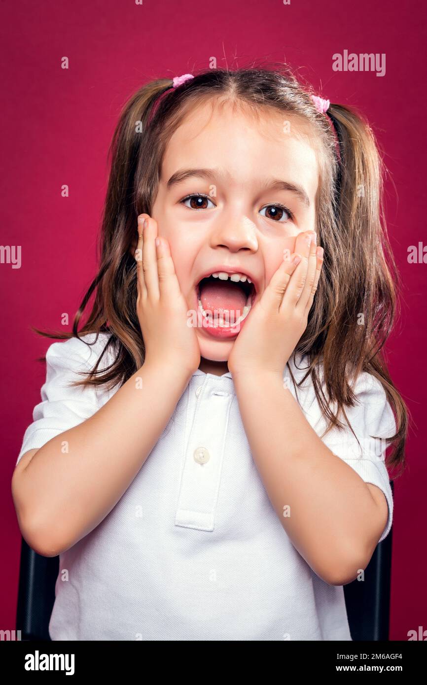 Funny Little Girl wit Surprise Expression Stock Photo - Alamy