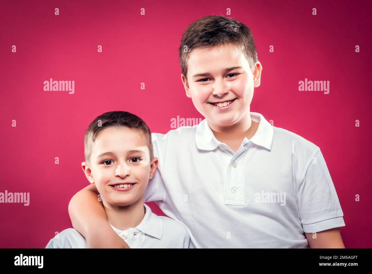Little Brothers Smiling Stock Photo - Alamy