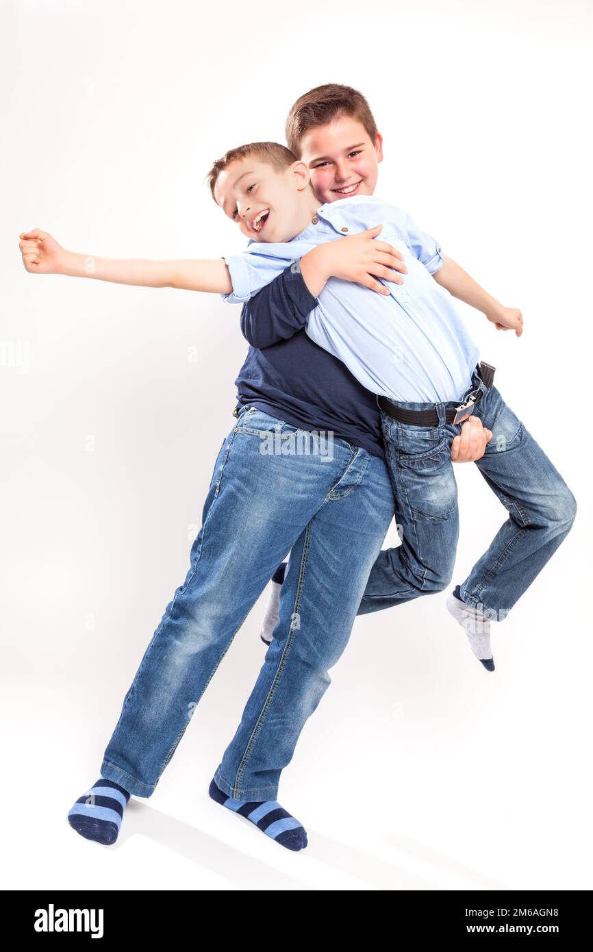 Two Brothers Laughing and Playing Stock Photo - Alamy