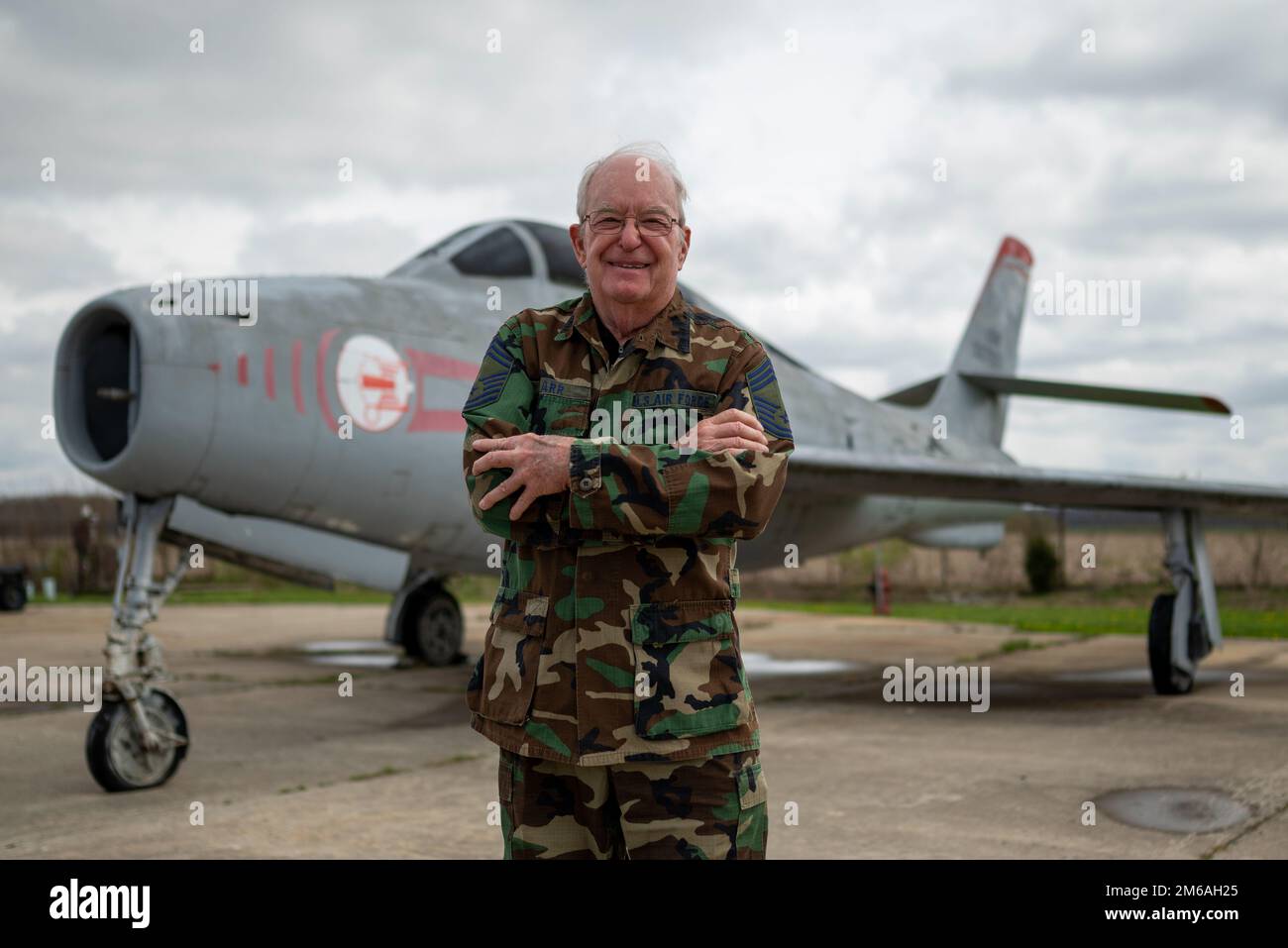Retired U.S. Air Force Chief Master Sgt. Les Parr stands in front of an ...