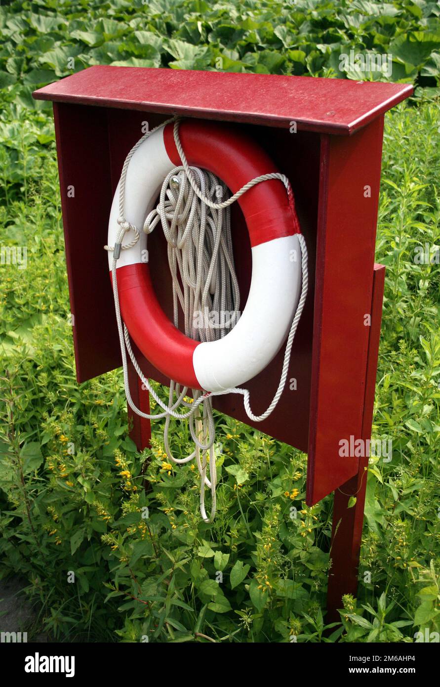 Red life rescue ring hi-res stock photography and images - Alamy