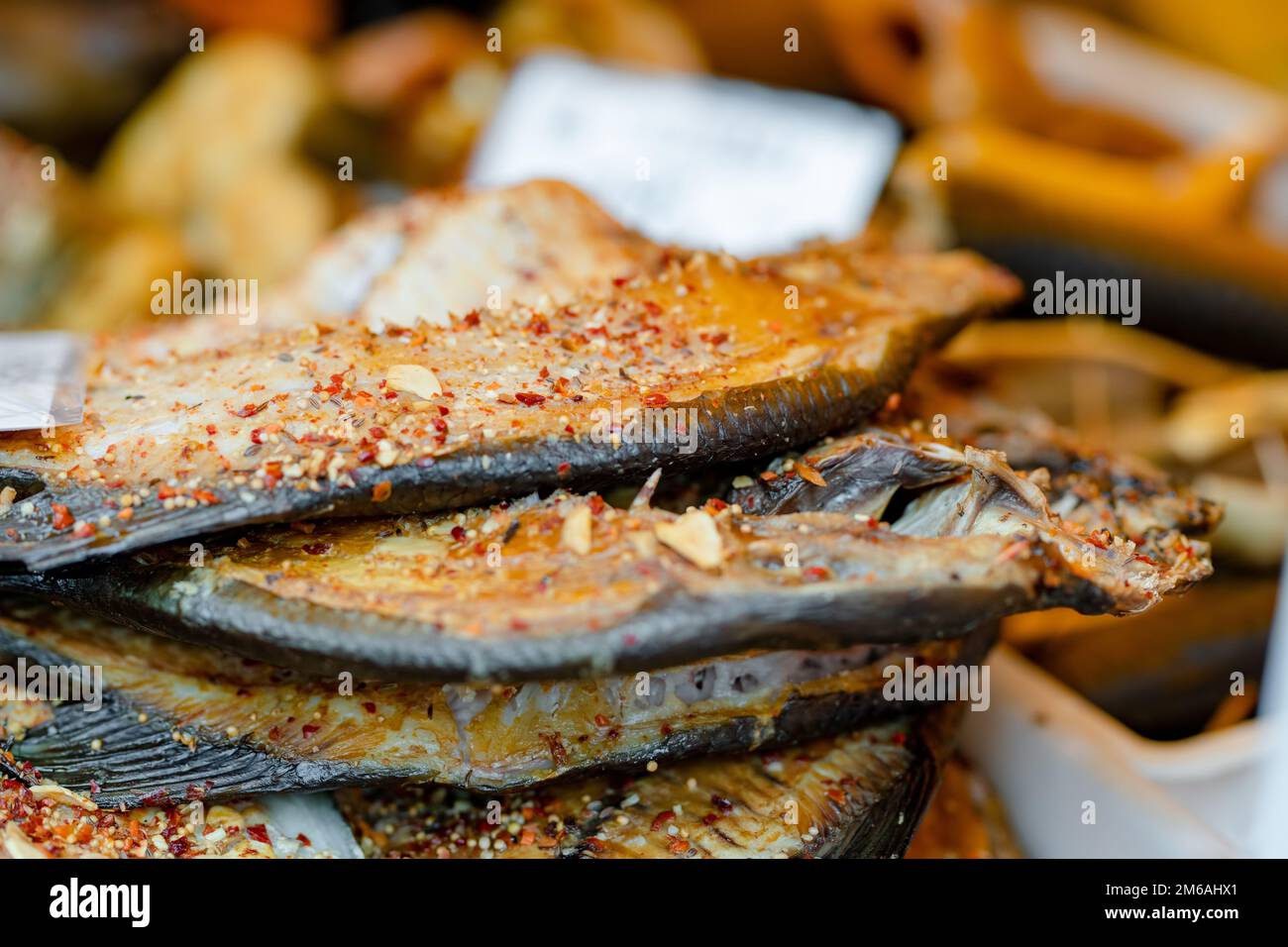 Selection of assorted home made smoked fish on a farmers market in ...