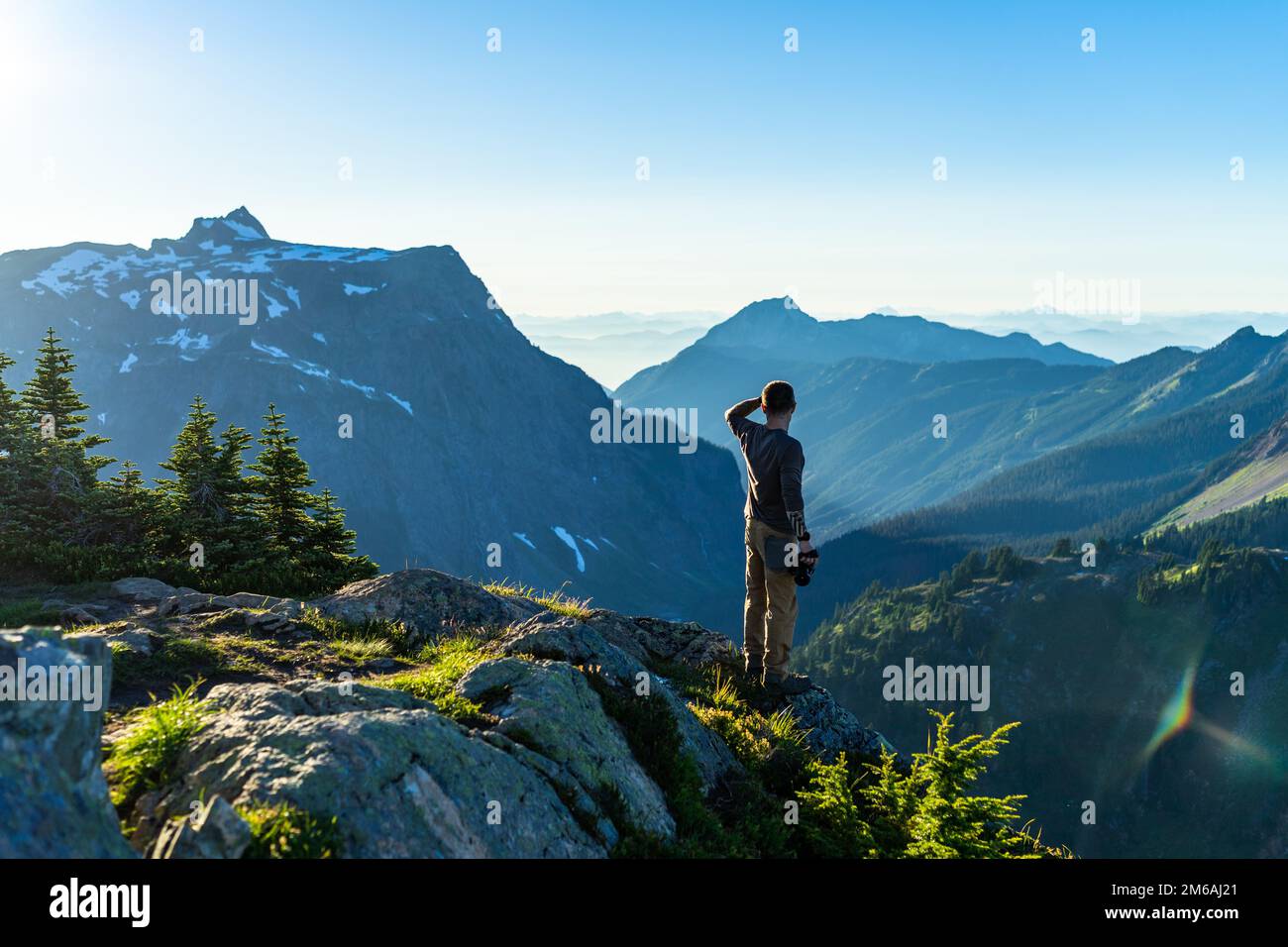 Looking for the best angle in North Cascades Stock Photo - Alamy