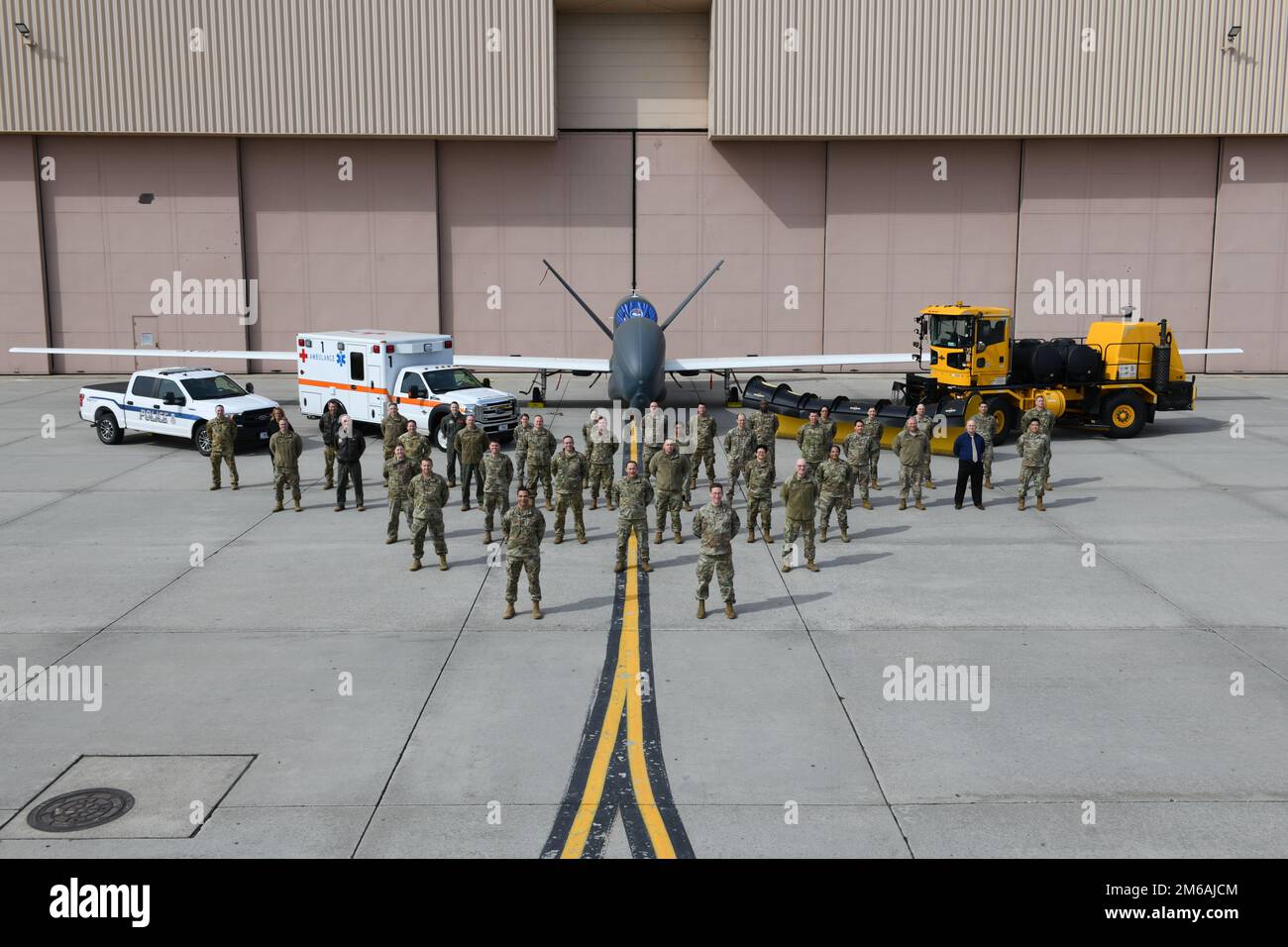 Leaders across the 319th Reconnaissance Wing stand for a group photo ...