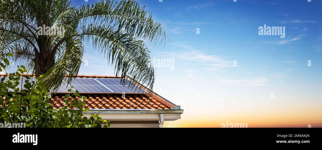 Solar Panels on the Roof in a Sunny and Cloudy Day. Photovoltaic ...