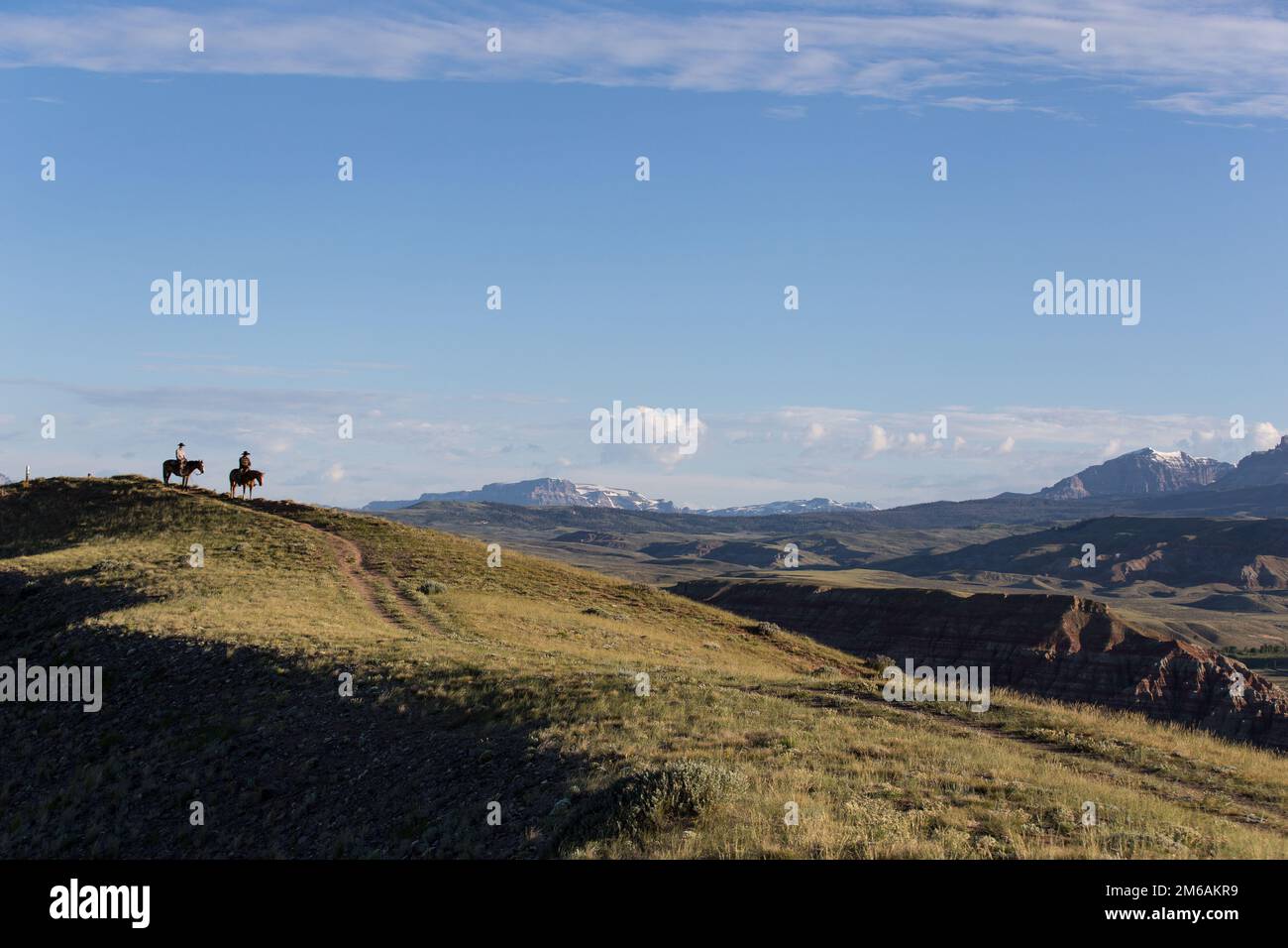 Two cowboys riding horses hi-res stock photography and images - Alamy