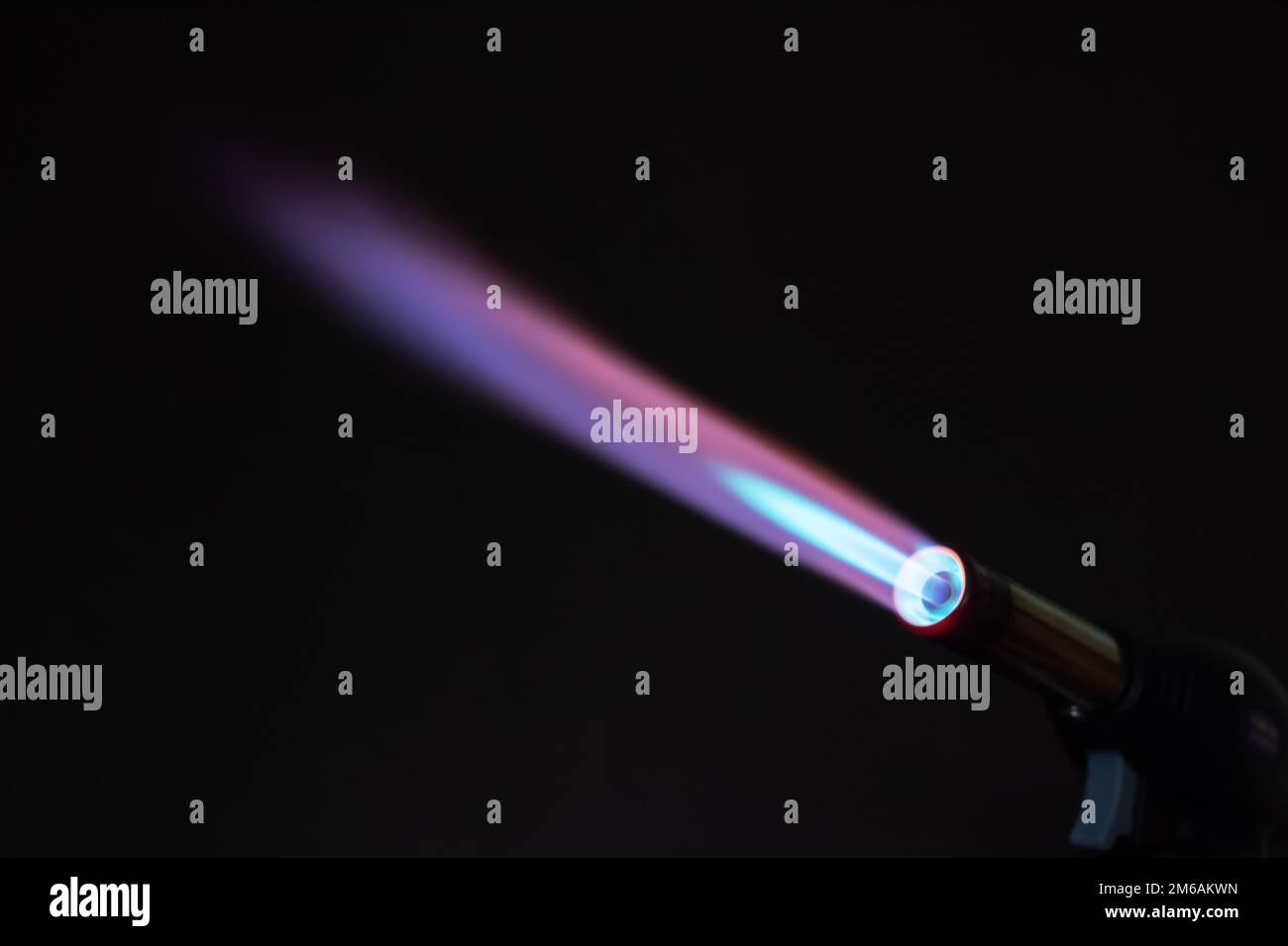 Blue flame. Macro view of a blue flame from a gas torch Stock Photo - Alamy
