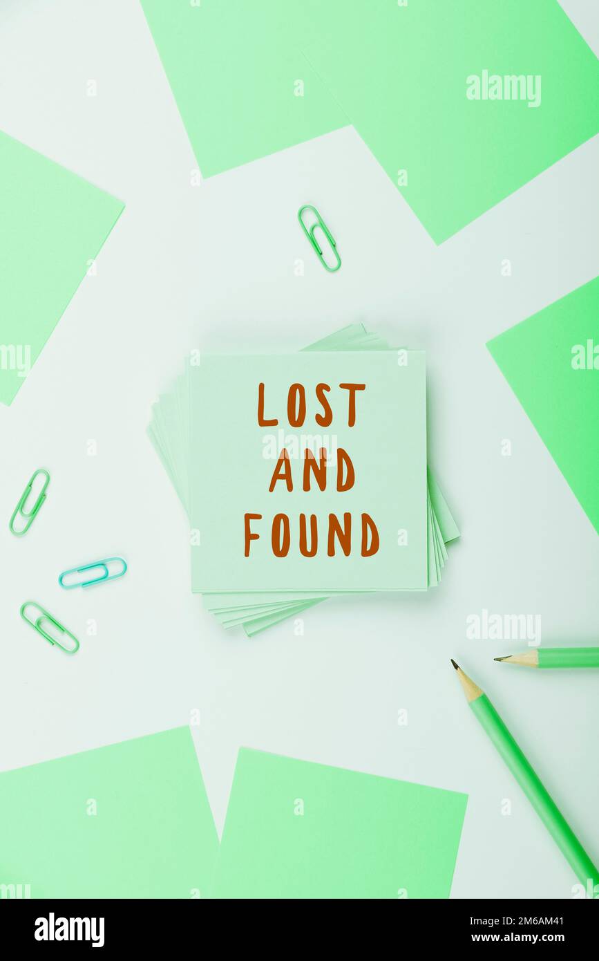 Hand writing sign Lost And Found. Word Written on Place where you can ...