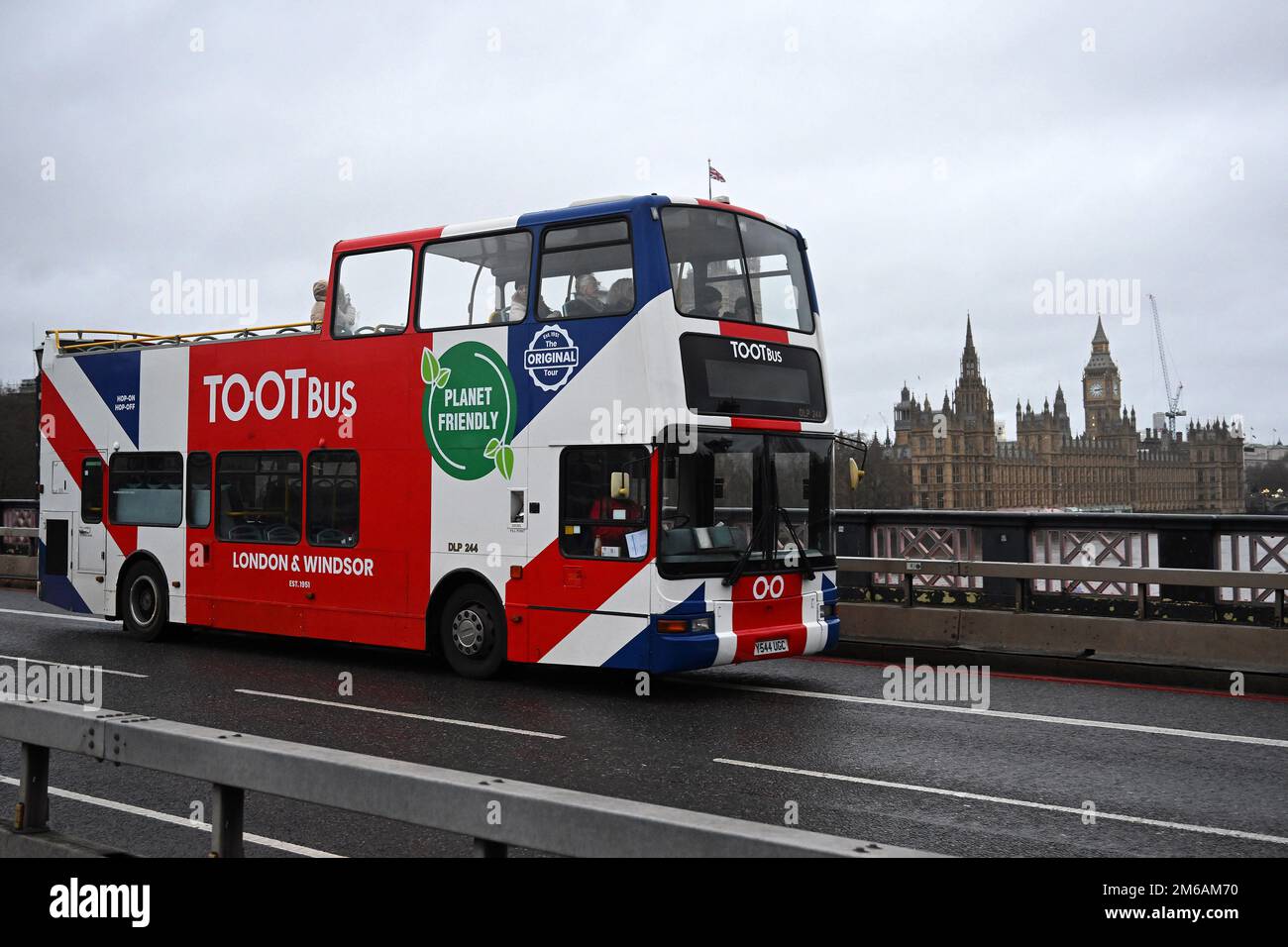 Toot Bus. Houses of Parliament and Big Ben in the Background. London ...