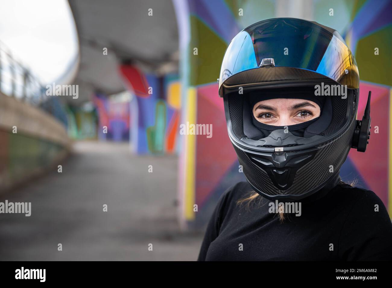 Motorcycle girl excited for the ride Stock Photo - Alamy