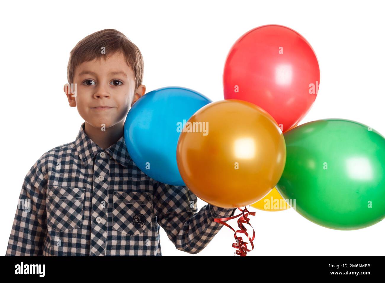 Boy with balloons Stock Photo - Alamy