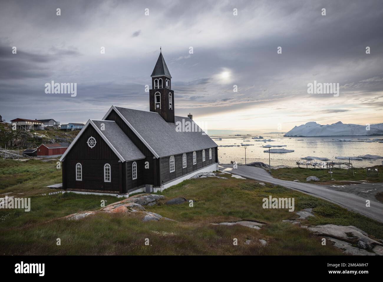 Colored church in ilulissat town Stock Photo - Alamy