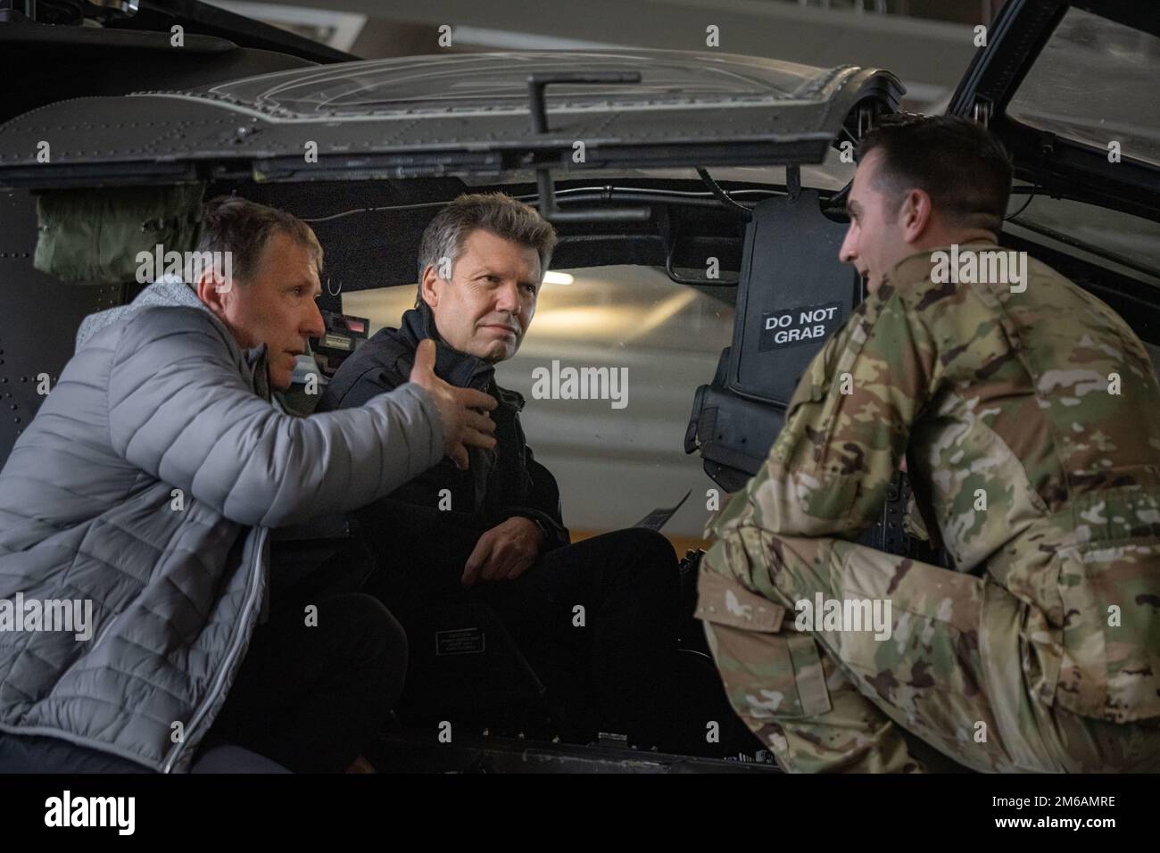 U.S. Army Capt. Bryan Westervelt, right, Apache pilot, Headquarters and ...