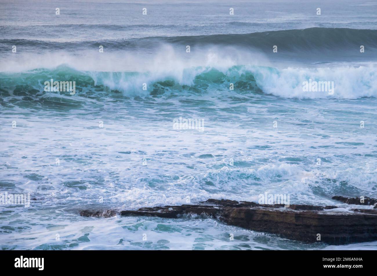 Big breaking Ocean wave on a beach Stock Photo - Alamy