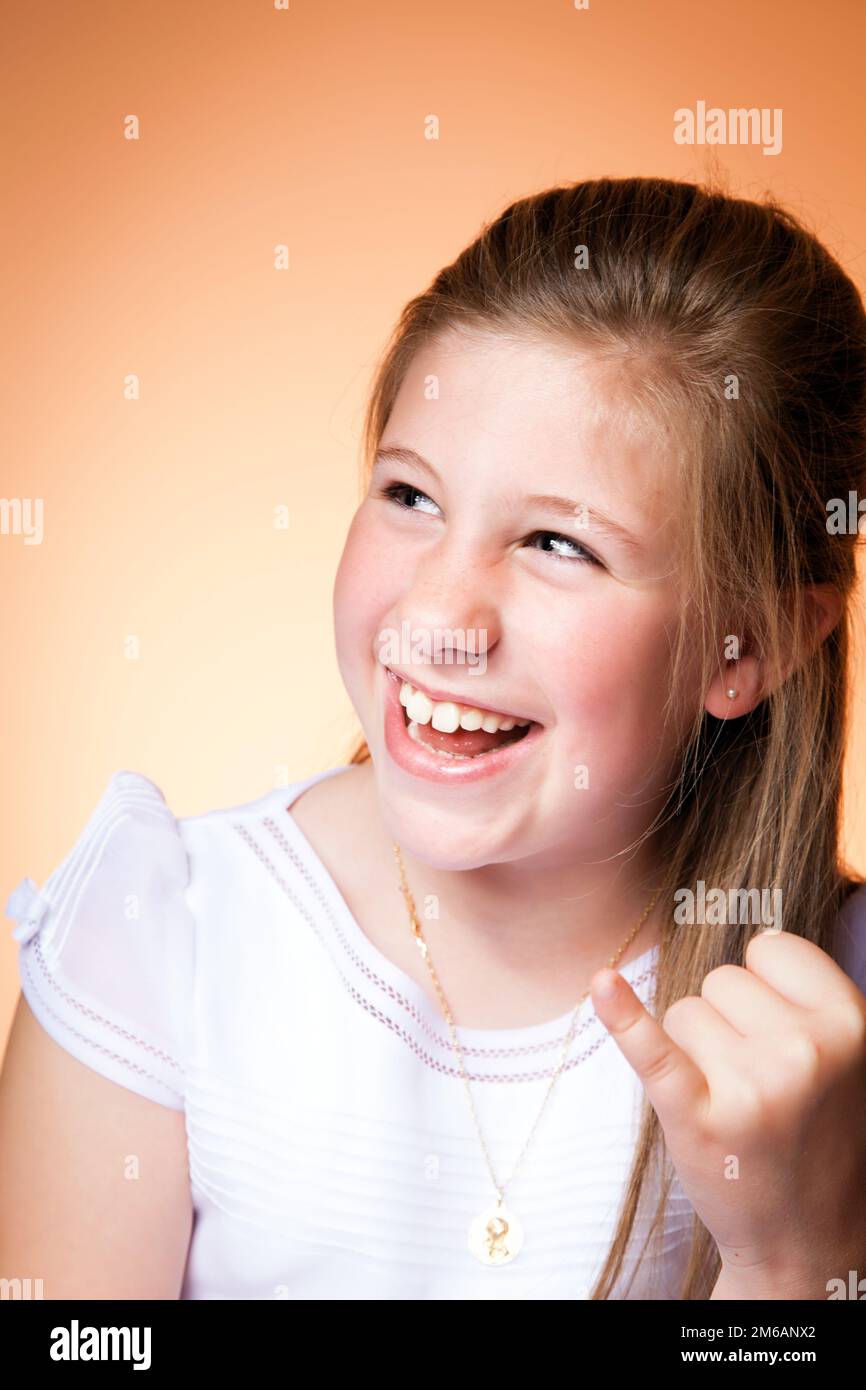 Girl in her First Communion Day Stock Photo - Alamy