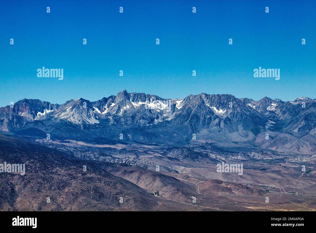 View from above of Sierra Nevada mountain range and valleys, near ...