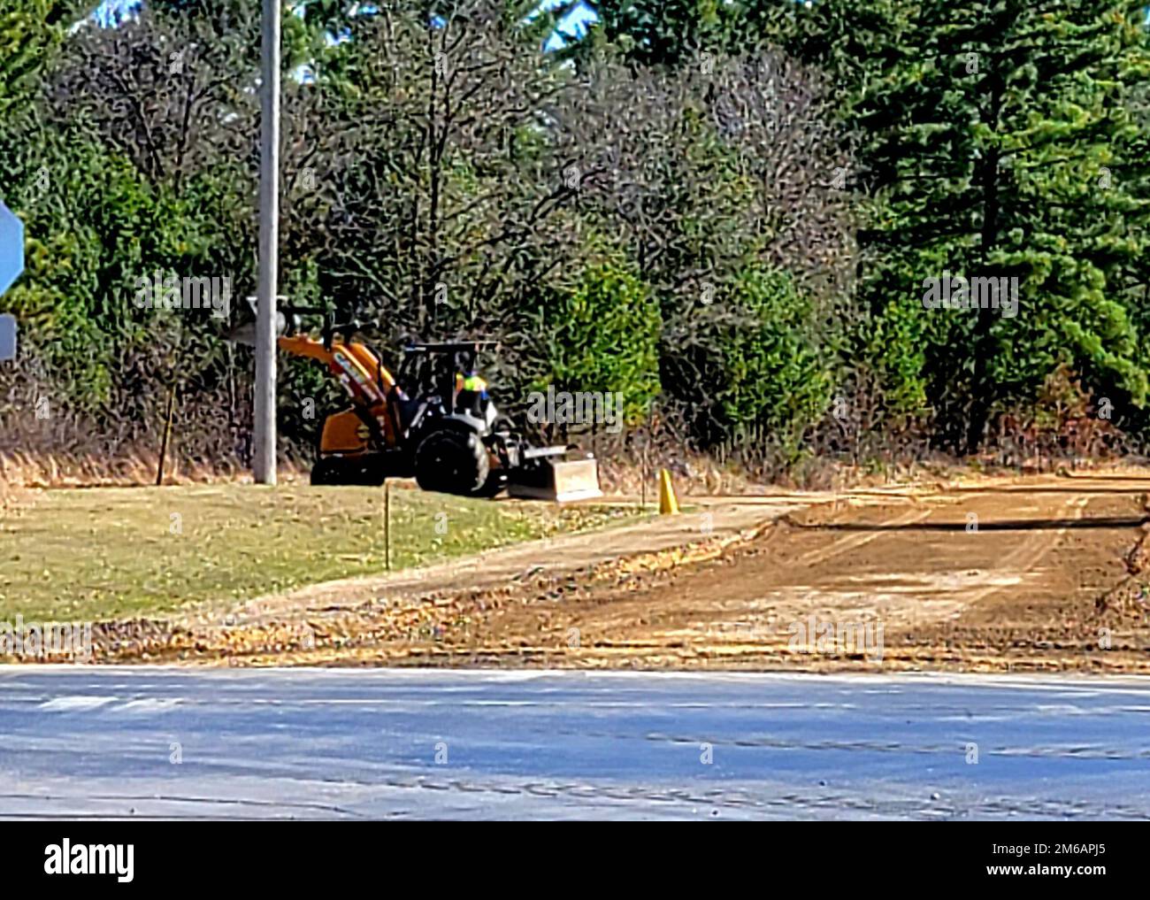 Workers with Mathy Construction of Onalaska, Wis., complete road ...