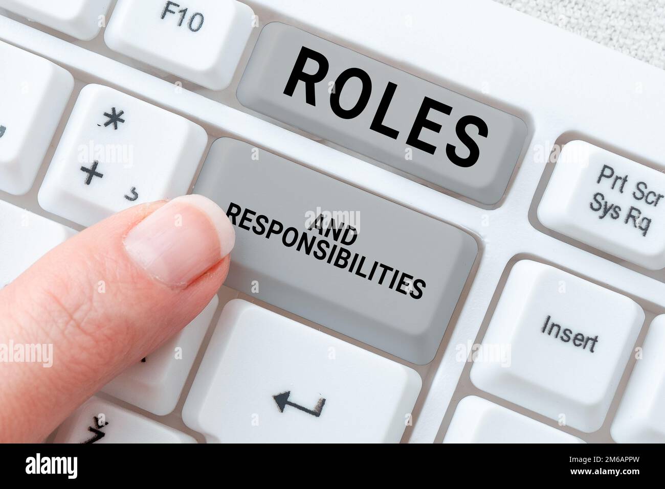 Writing Displaying Text Roles And Responsibilities Word Written On Business Functions And