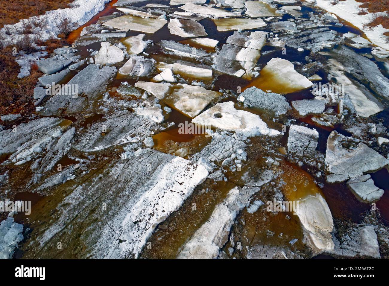 Drone shot, ice break-up, ice floes, Blackstone River, Yukon, Canada ...
