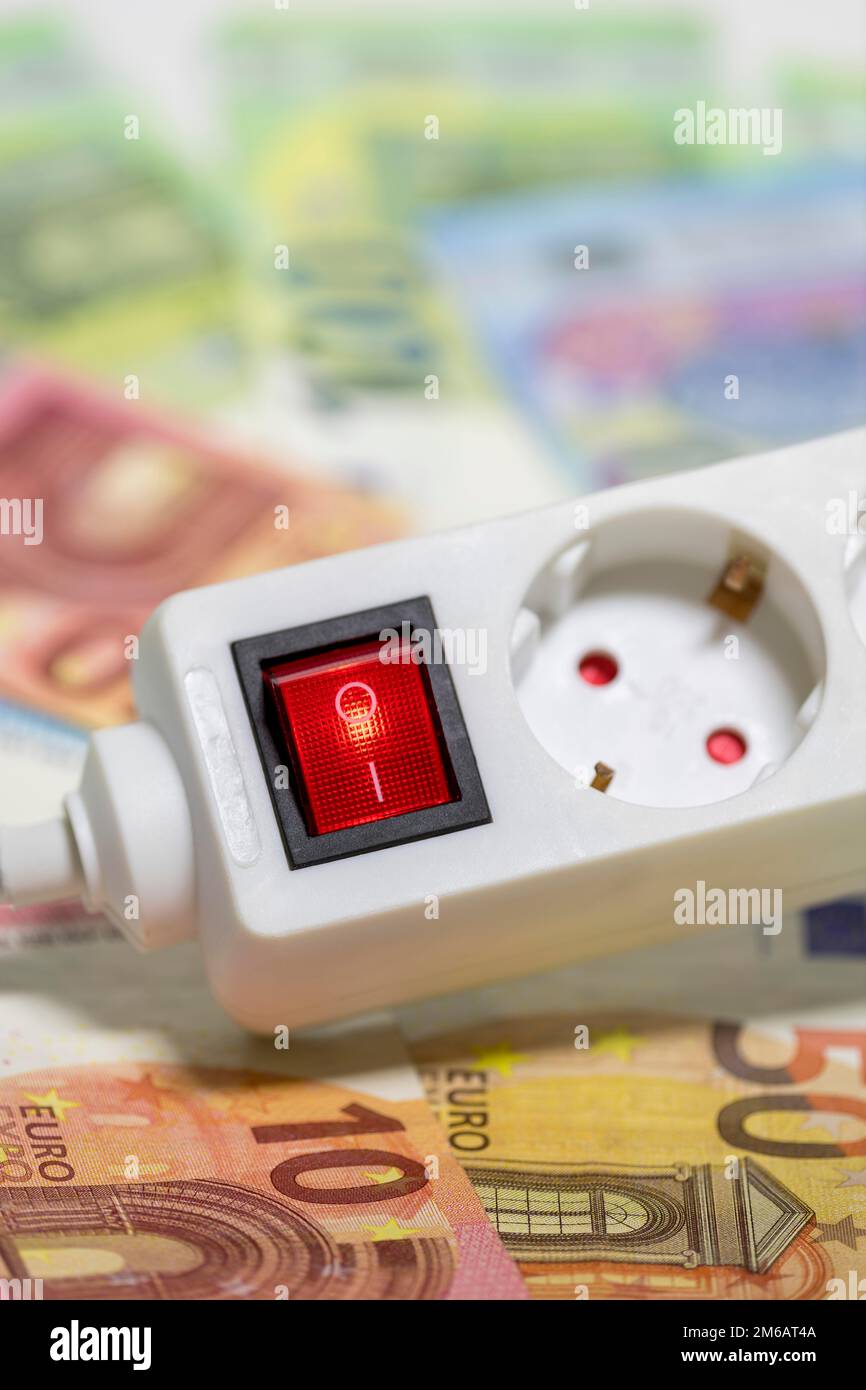 Switchable socket strip, euro banknotes, symbolic image energy costs ...