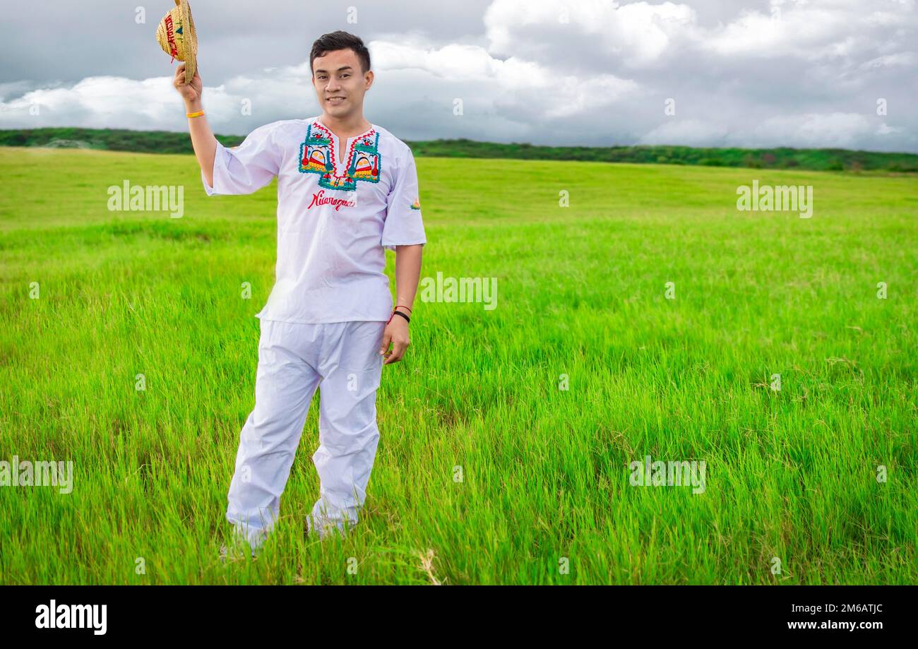 Man wearing Central American folk costume. Young man in cultural and ...